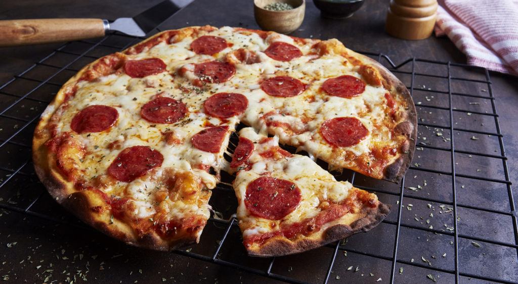 TikTok reviews Pizza Hut's new Hot Honey Pizza with crispy Pepperoni cups